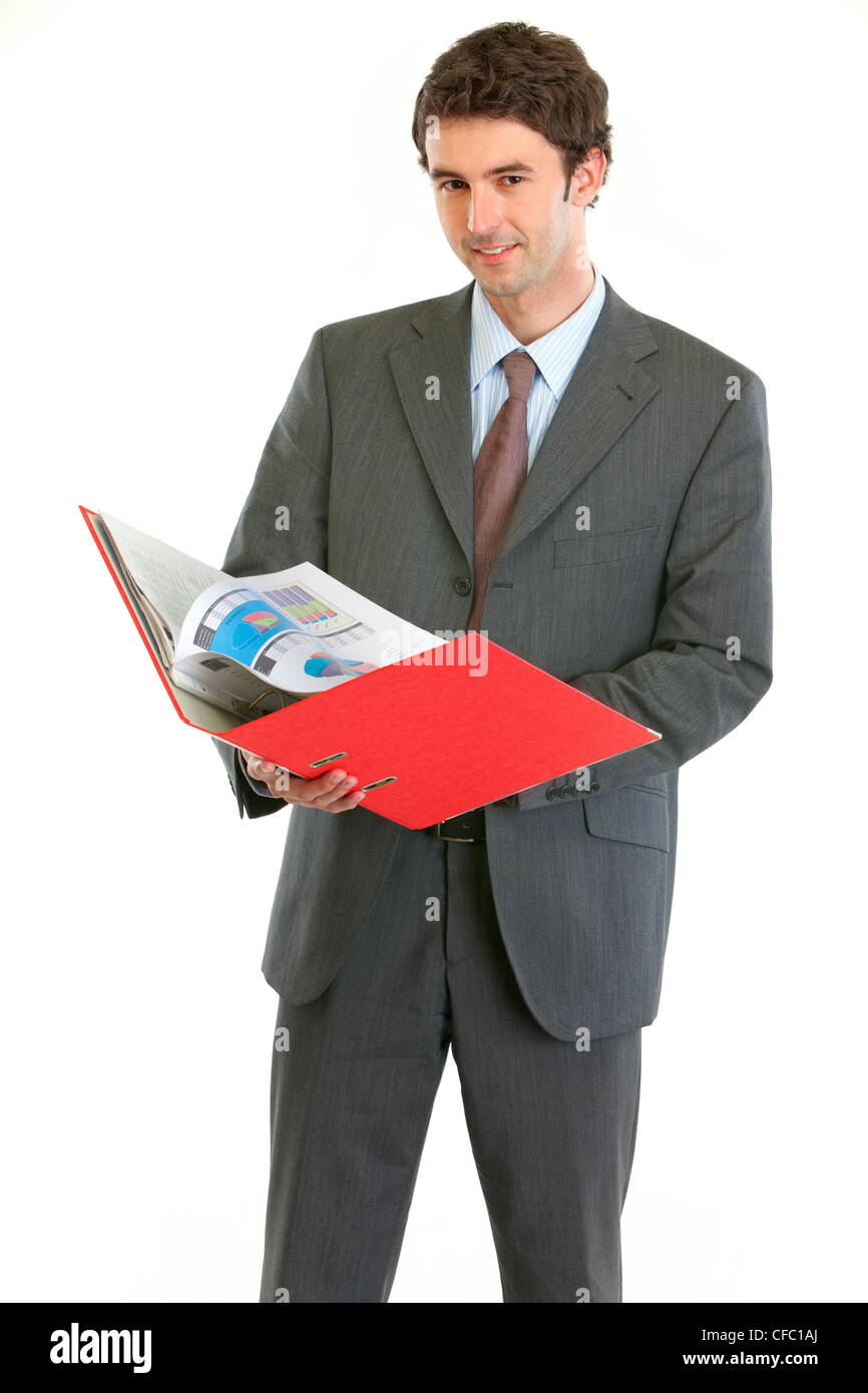 Modern business man checking documents in folder Stock Photo - Alamy