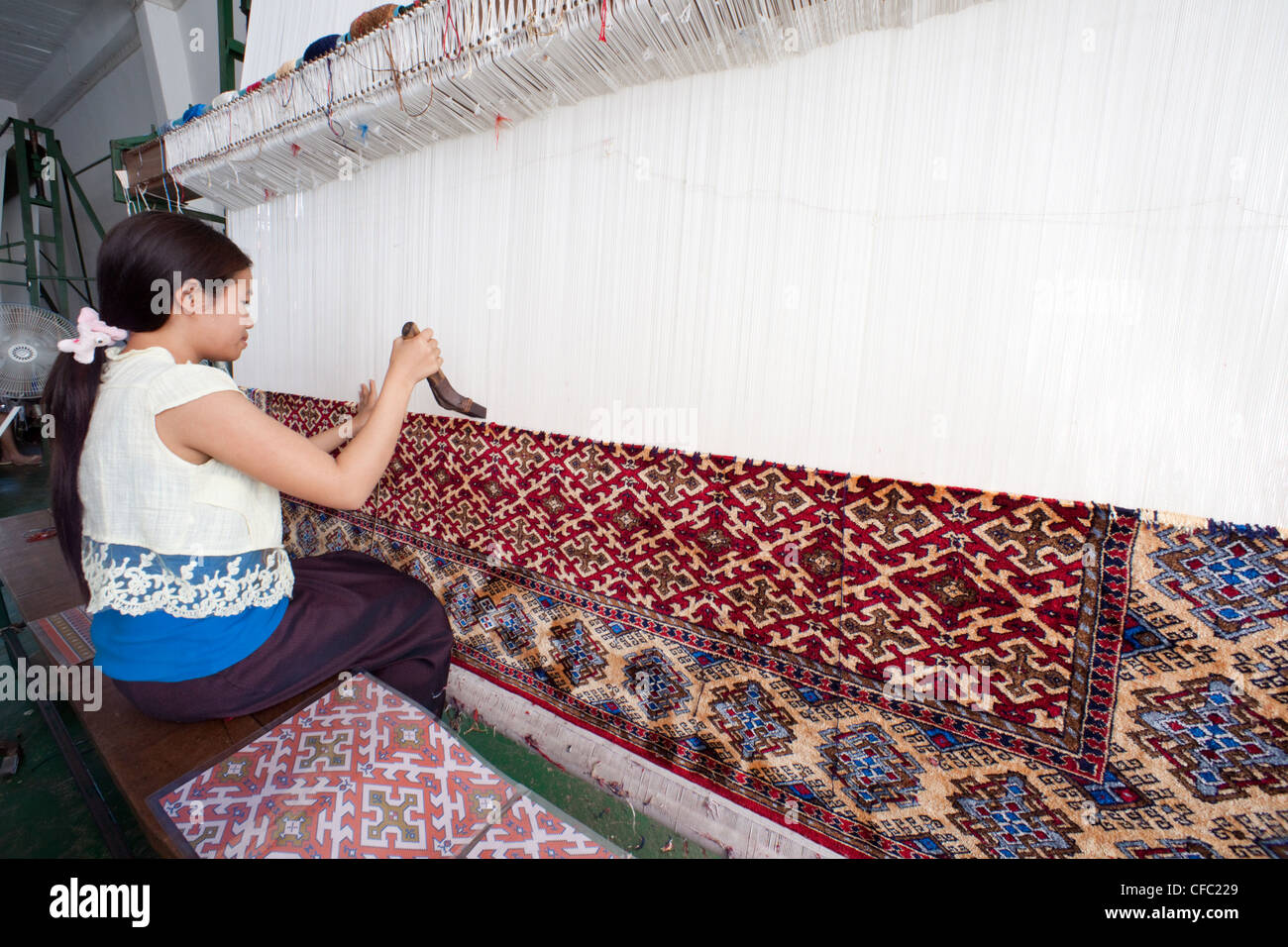 Laos, Vientiane, Magic Lao Carpet Handicrafts, Girl Weaving Carpet ...