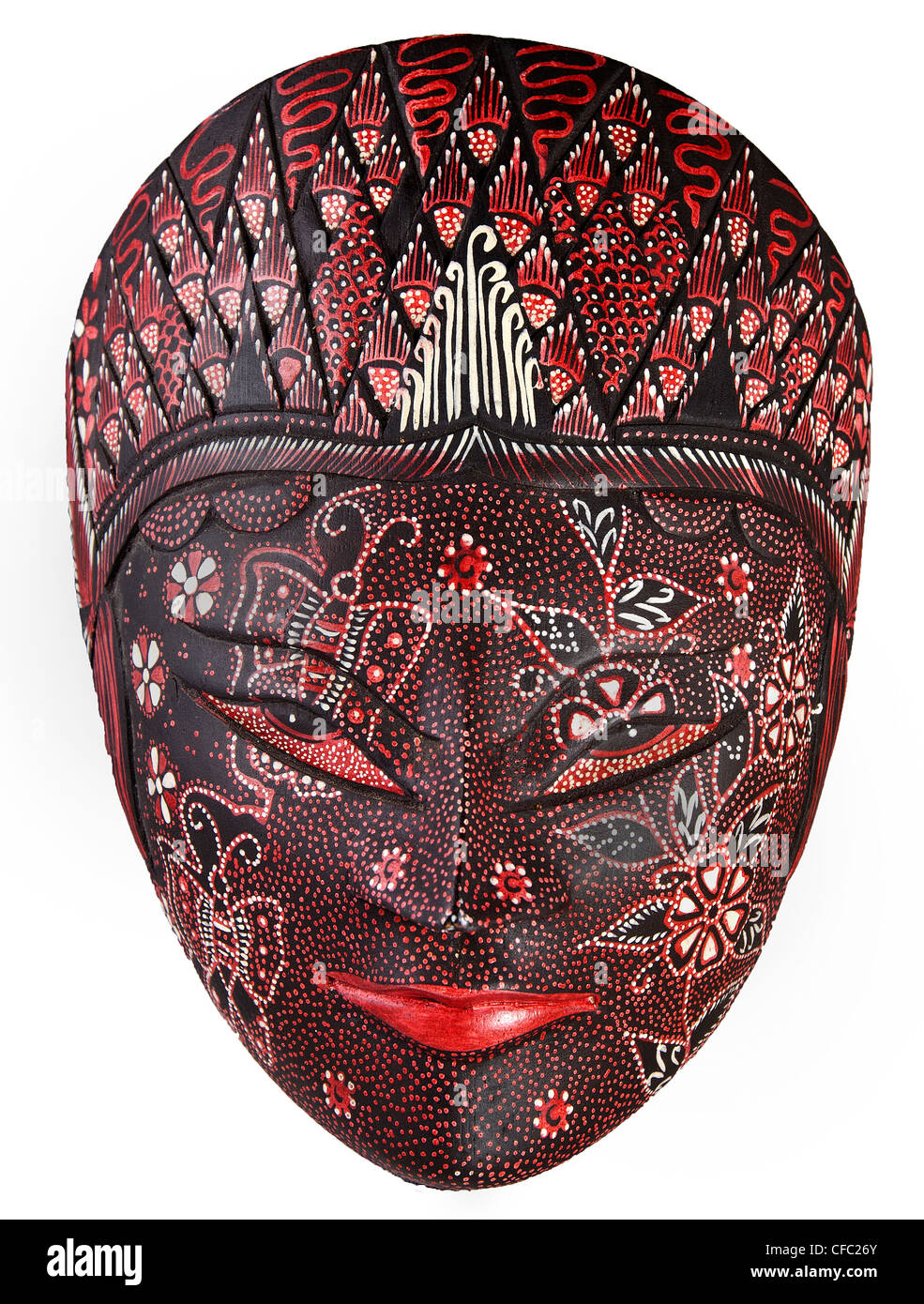 Ornate colorful mask carved from wood and painted Stock Photo - Alamy