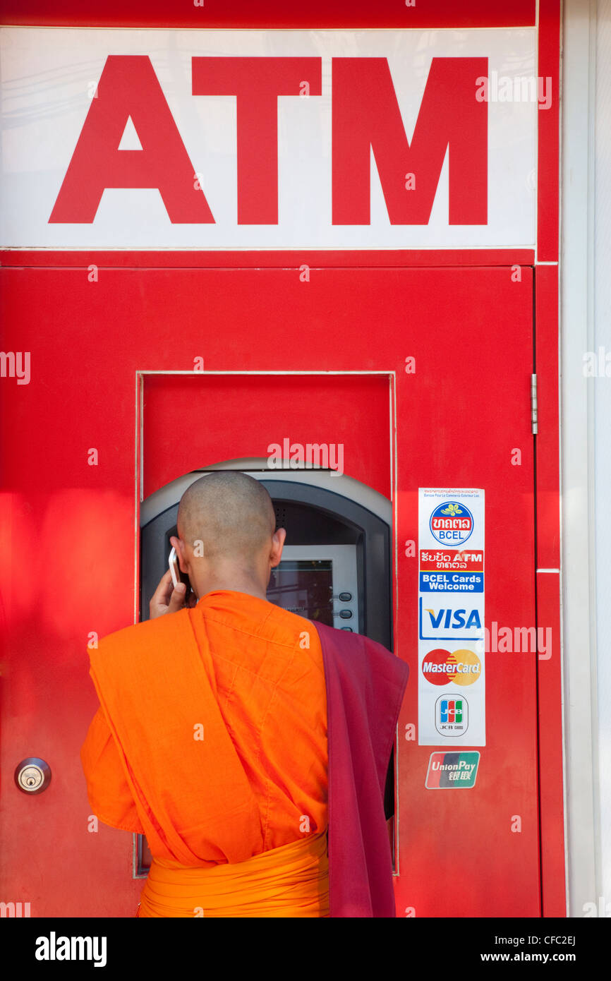 Buddhist monk at atm machine hi-res stock photography and images - Alamy