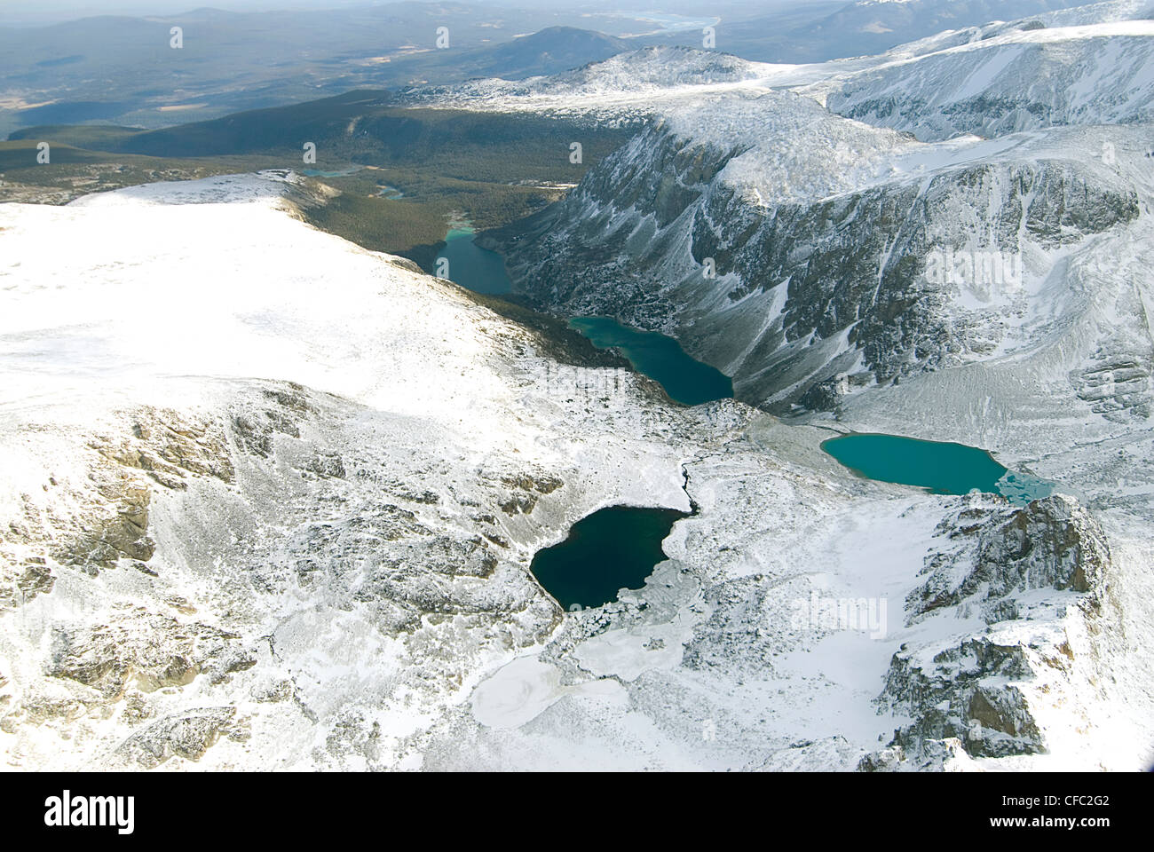 Early snowfall in the Niut Range, showing several alpine lakes of ...