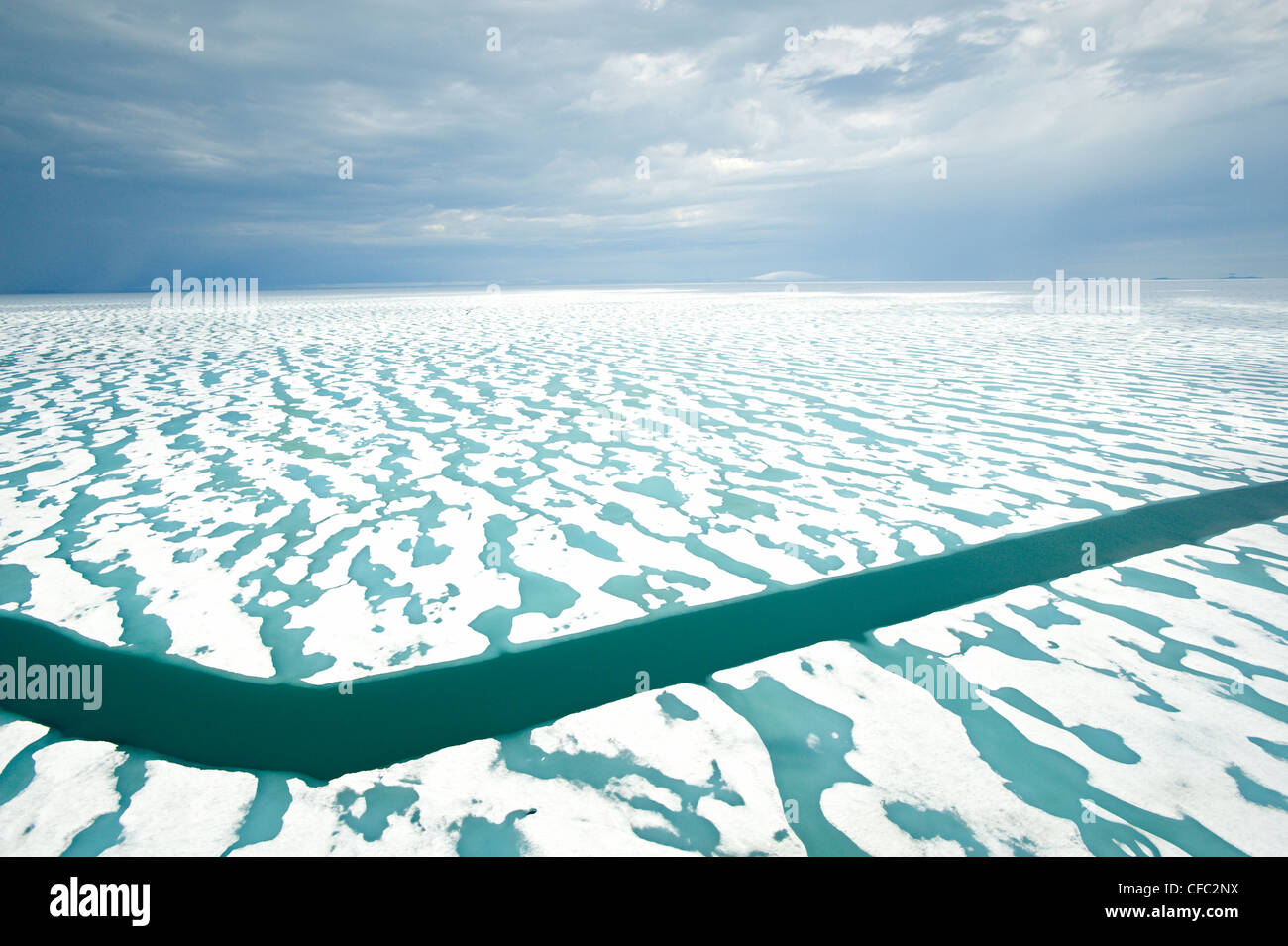 Patterns of melting sea ice, Arctic Ocean, Nunavut Stock Photo - Alamy
