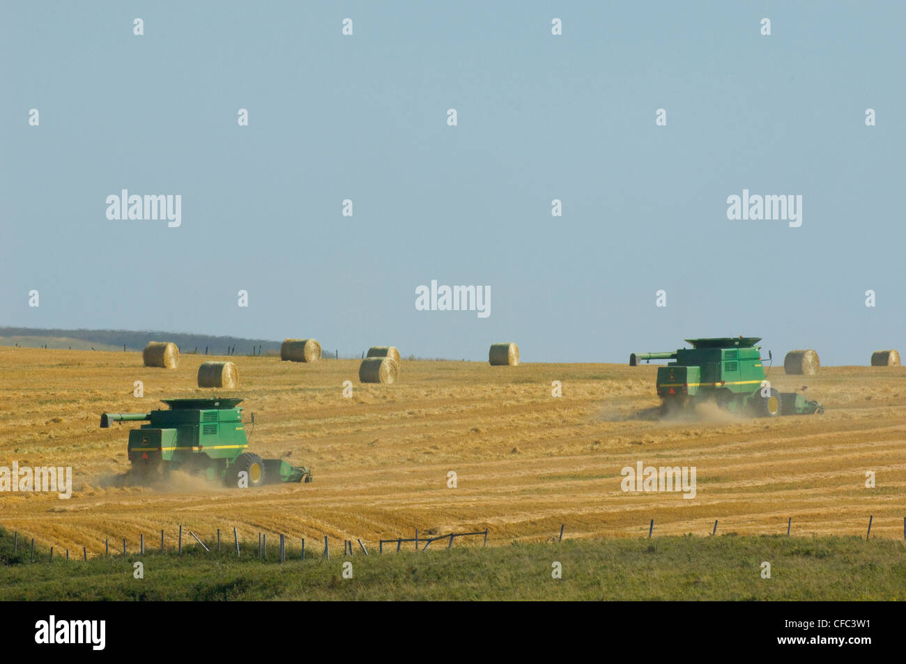 Combining Grain farmer might use own combine Stock Photo - Alamy