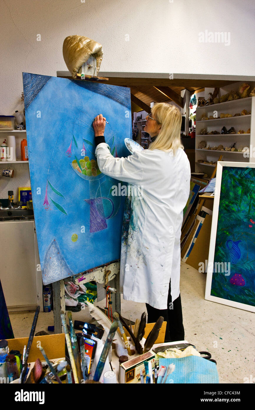 Painting artist in her studio Stock Photo - Alamy