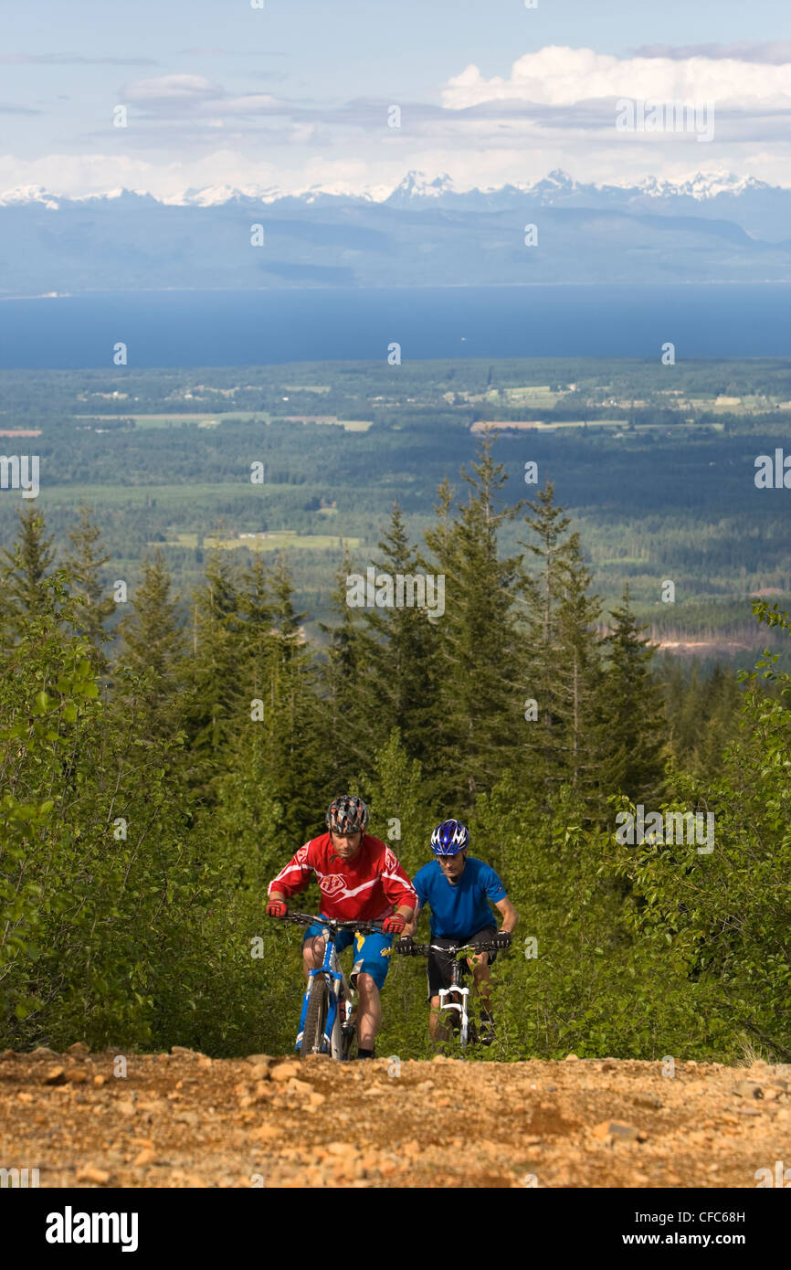 Mountain bikers near Courtney, Vancouver Island, British Columbia ...
