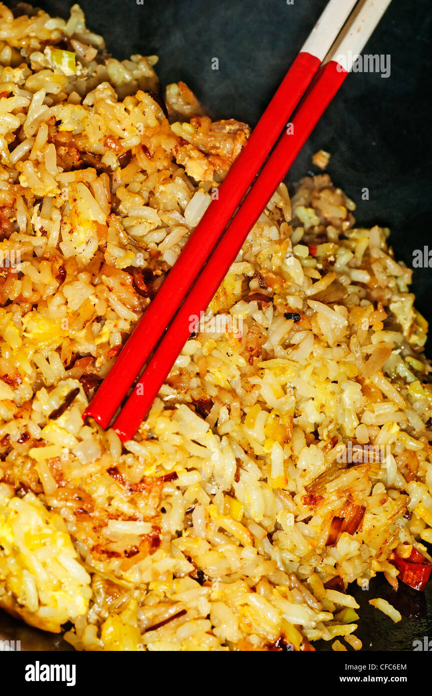 baked rice with chopsticks Stock Photo - Alamy