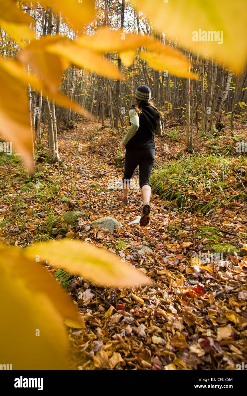 Young woman running around track hi-res stock photography and images ...