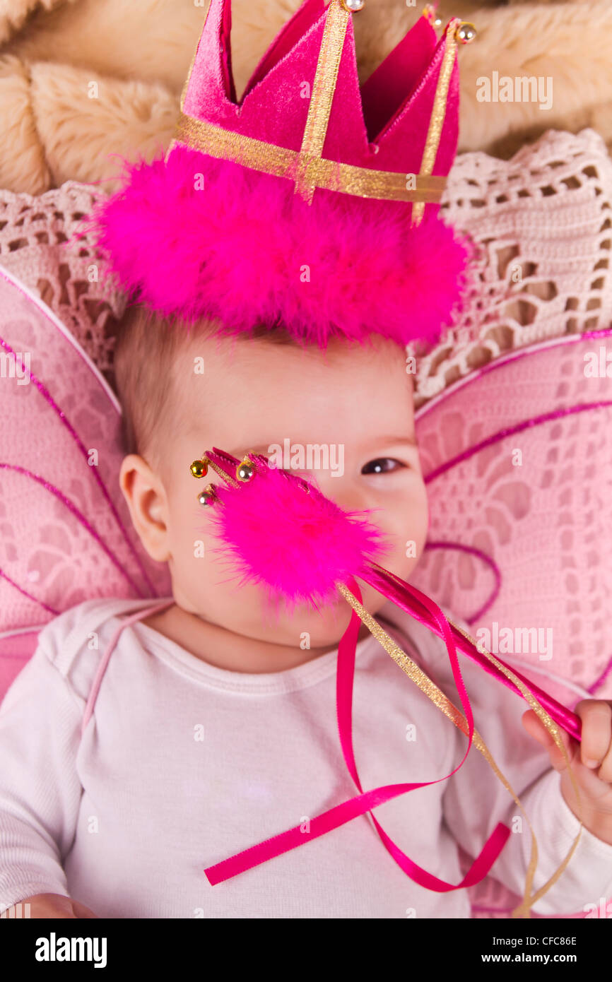 View of a newborn baby with princess hat Stock Photo - Alamy