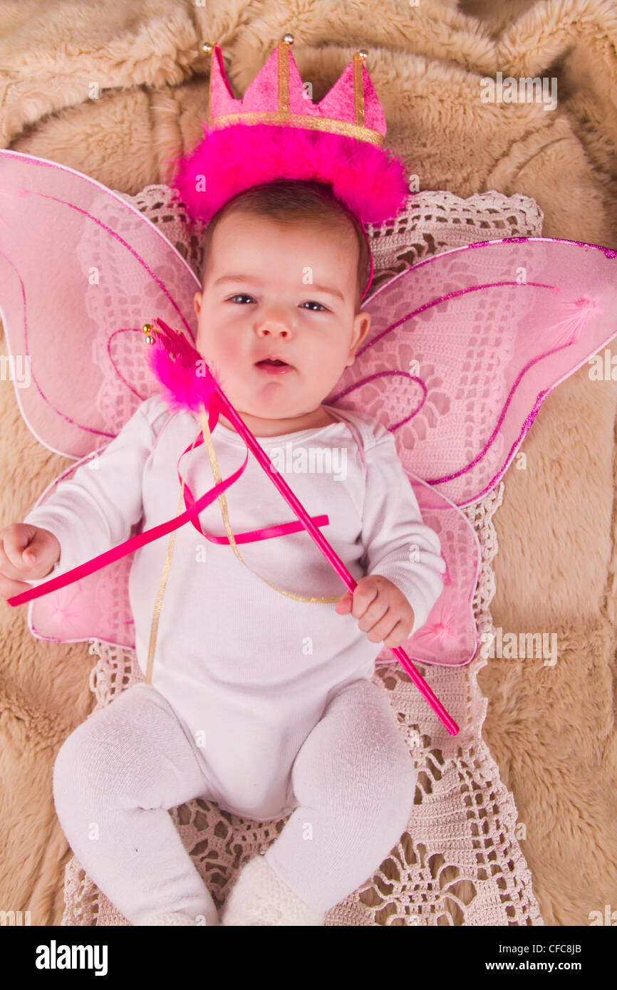 View of a newborn baby with princess hat Stock Photo - Alamy