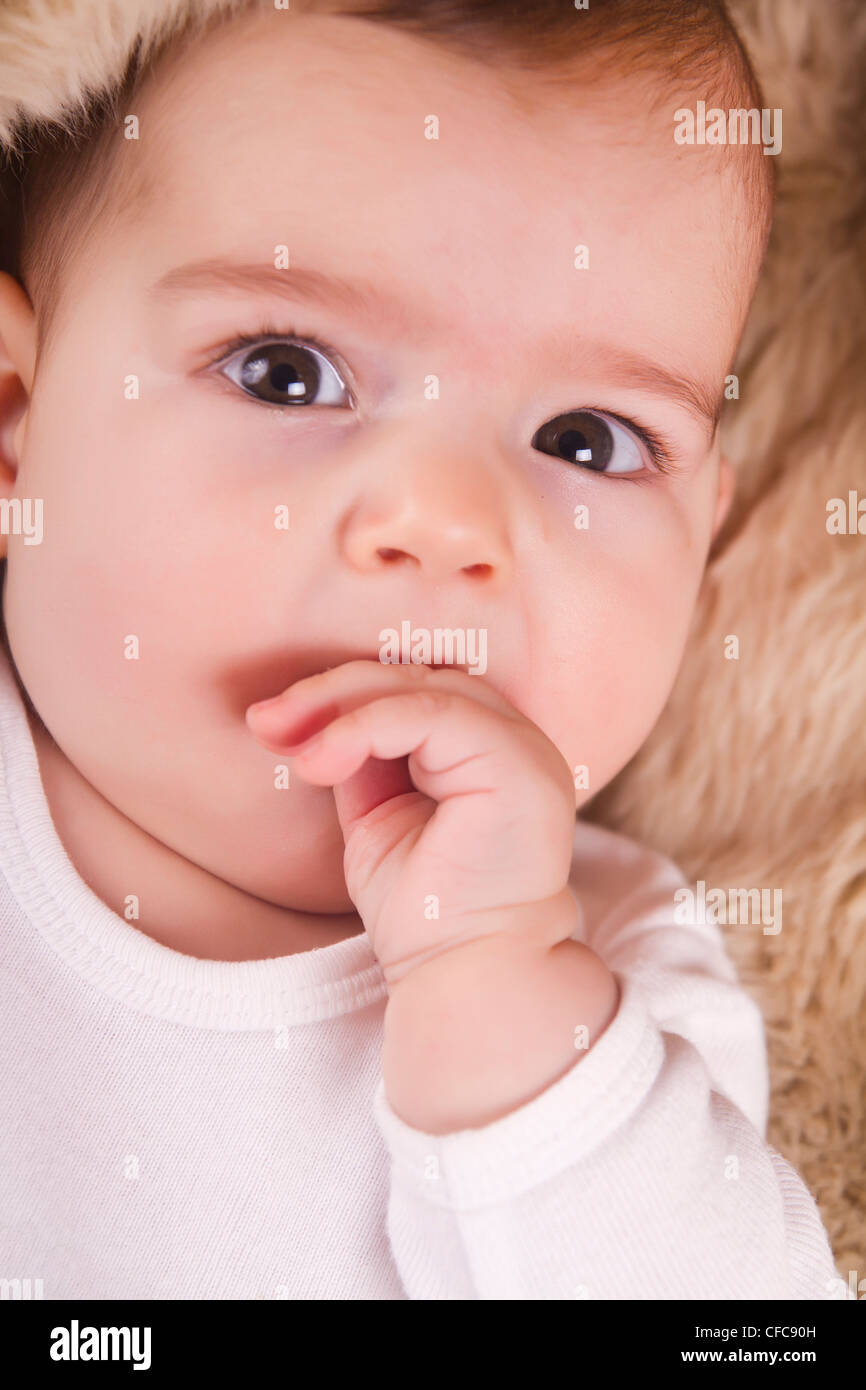 Close up view of a newborn baby face Stock Photo - Alamy