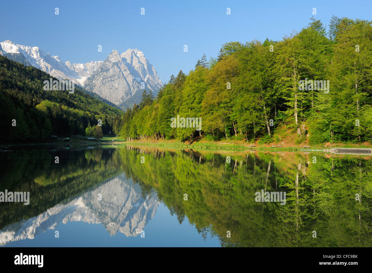 Zugspitze range with Waxenstein reflecting in lake Riessersee ...