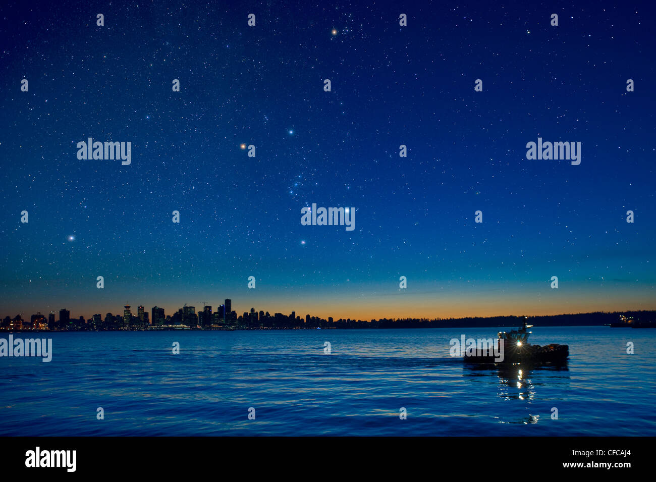 The constelation Orion setting after dusk over the vancouver skyline ...