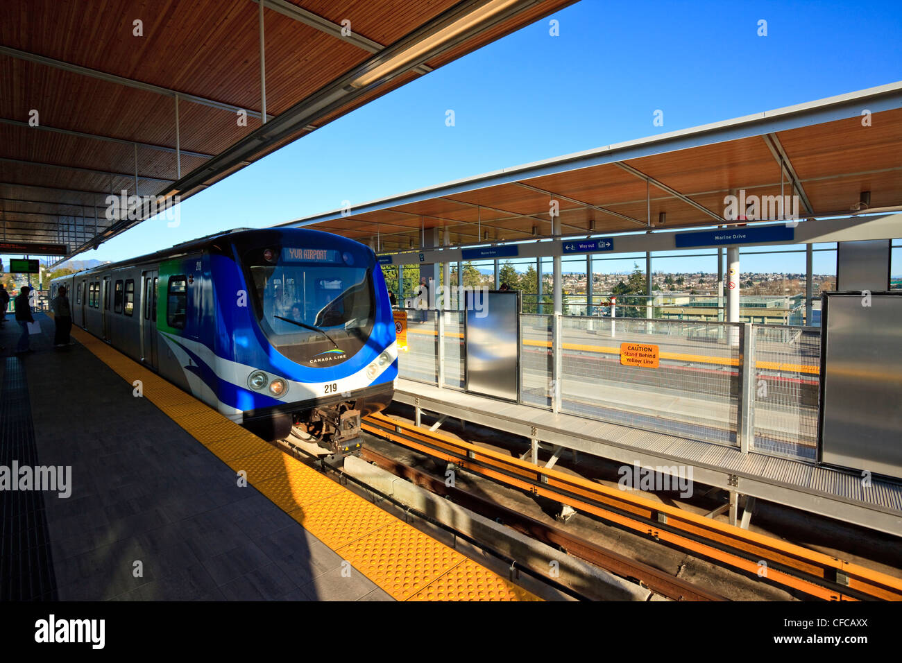 Passengers wait board CanadLine light rapid Stock Photo - Alamy Passengers wait board CanadLine light rapid Stock Photo - Alamy