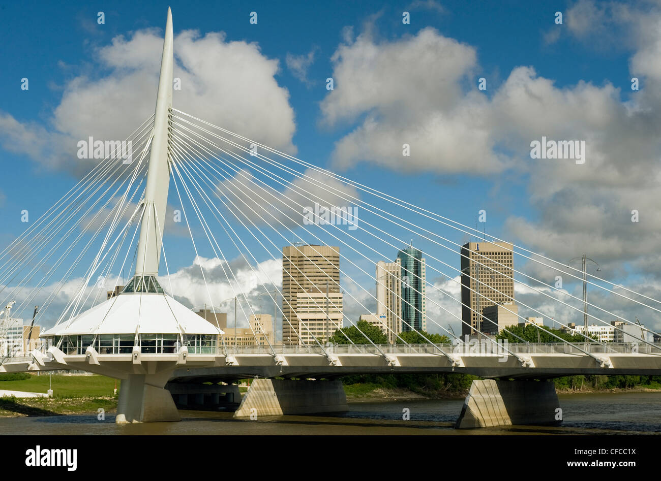 Winnipeg skyline from St. Boniface showing Esplanade Riel Bridge across ...