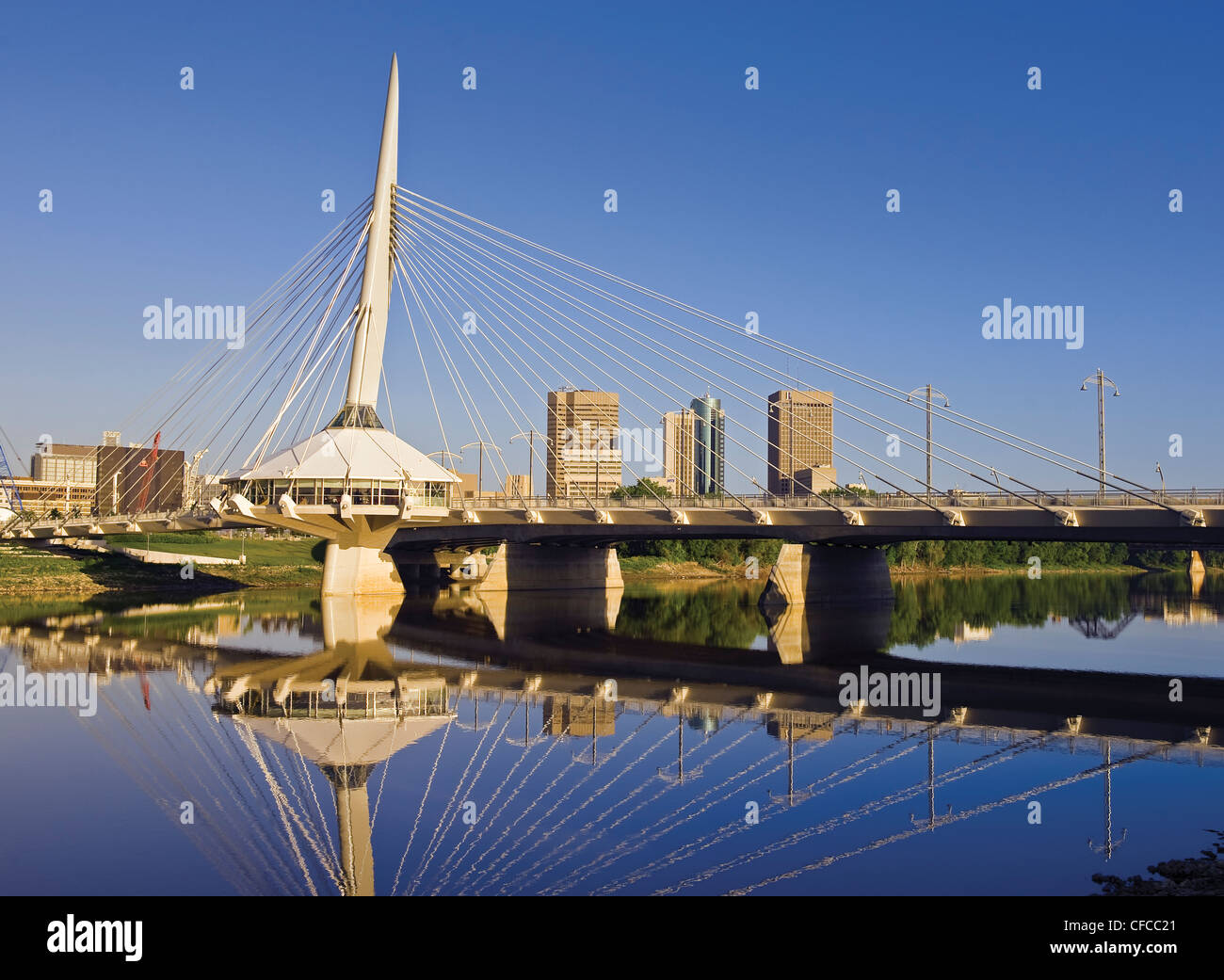 Winnipeg skyline from St. Boniface showing the Esplanade Riel bridge ...