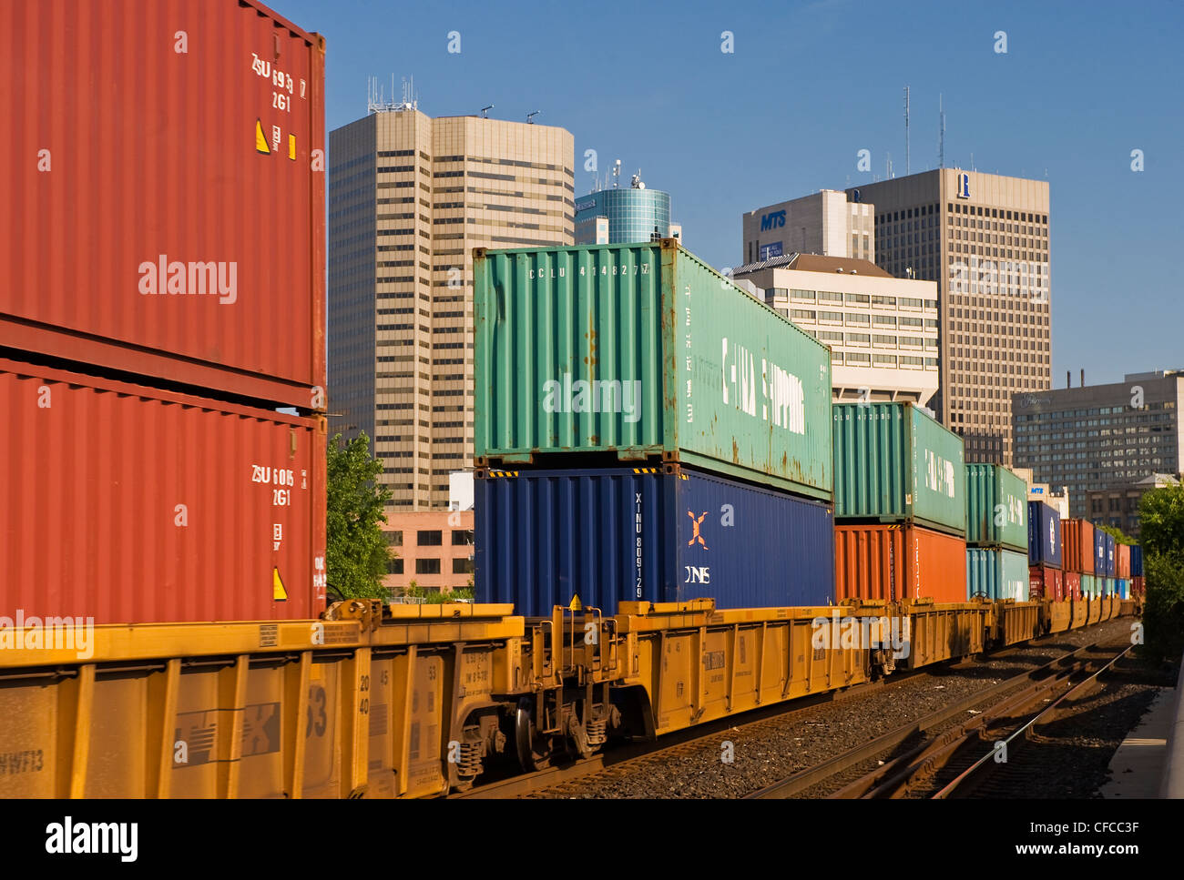 rail cars carrying containers pass through Winnipeg, Manitoba, Canada ...