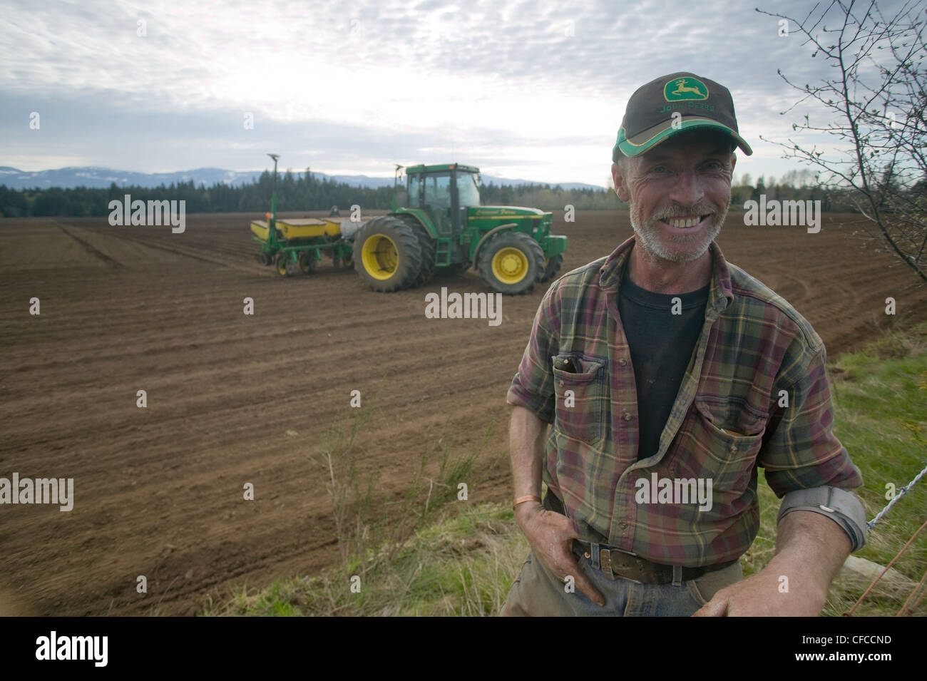 farmer planting corn takes break tractor refuel Stock Photo - Alamy