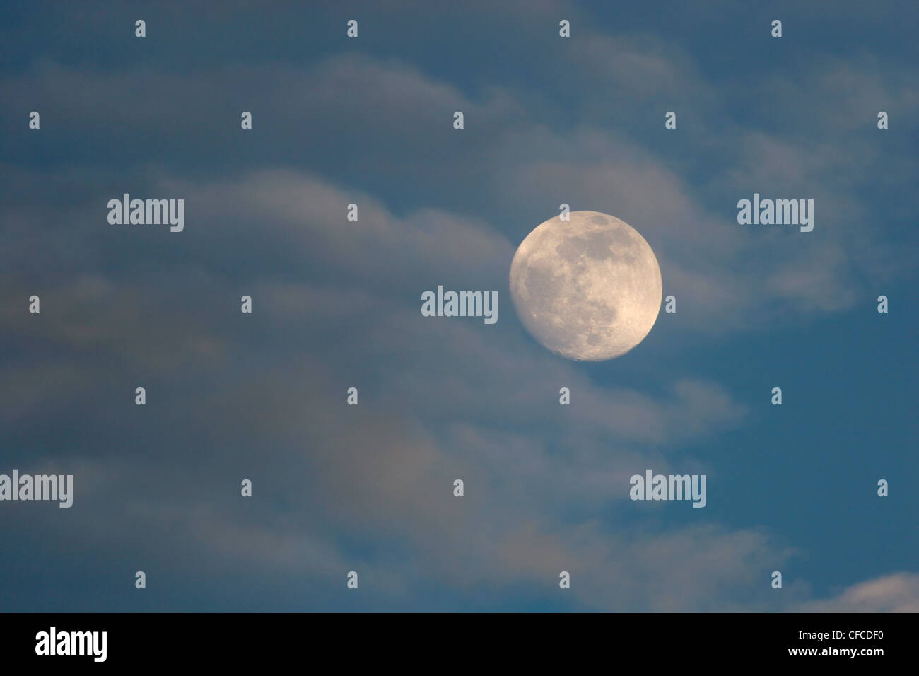 moon cirrus clouds at sunset Stock Photo - Alamy