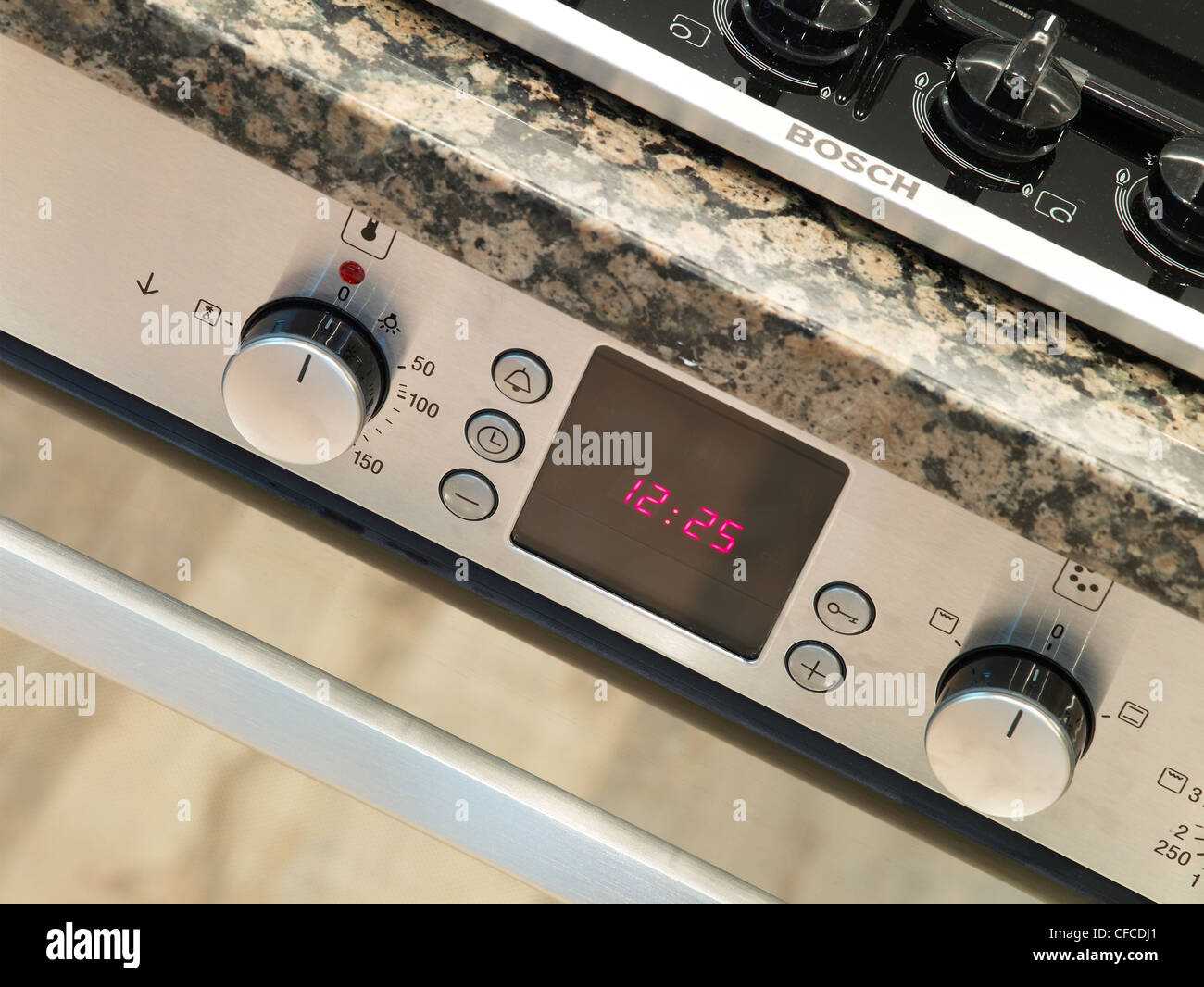 Cooker and oven hob in kitchen Stock Photo - Alamy