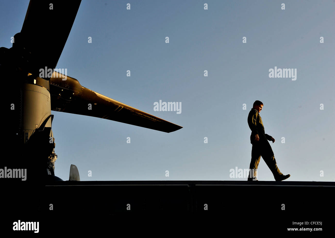 U.S. Air Force CV-22 Osprey flight engineers conduct pre-flight ...