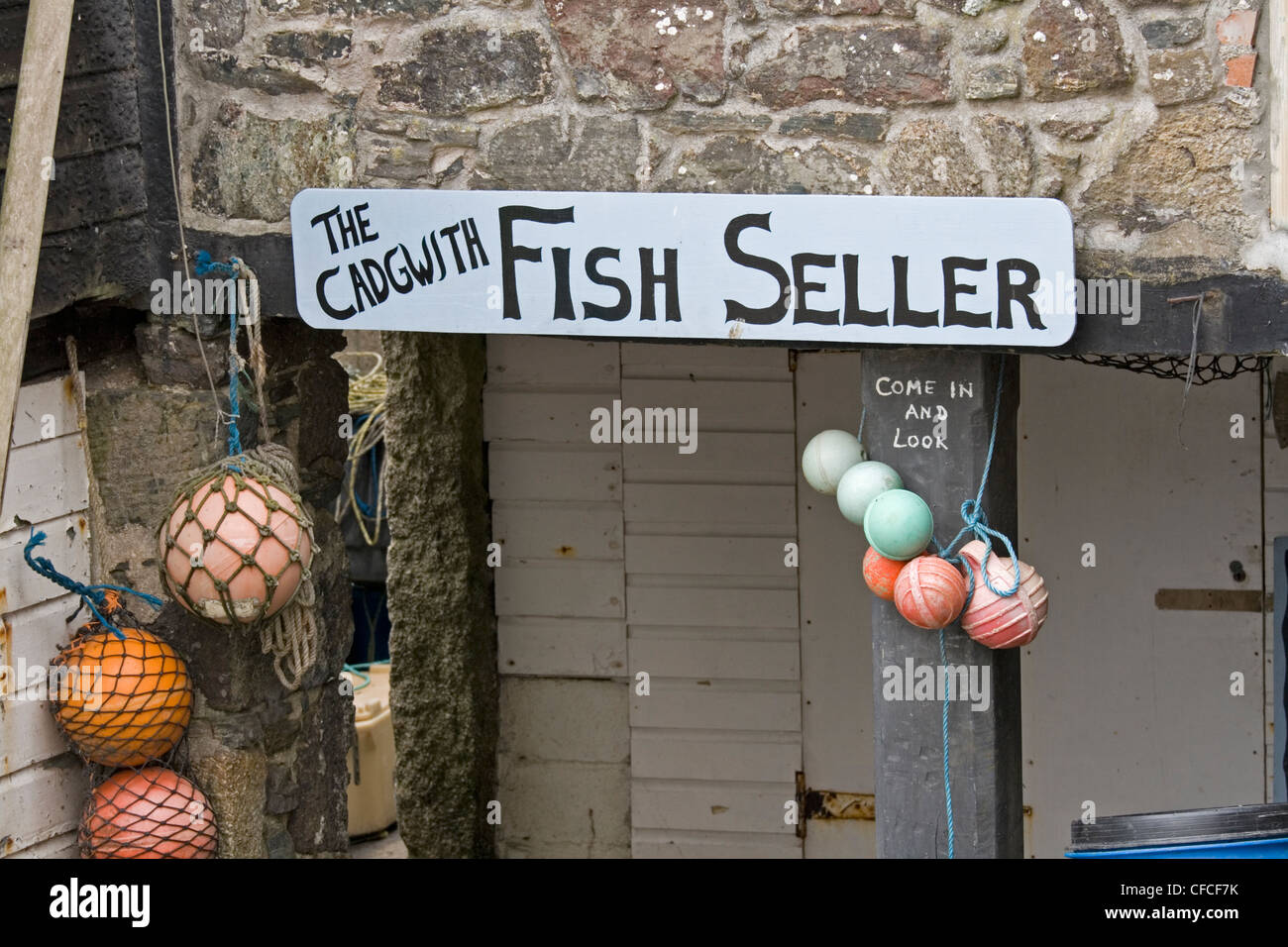 Fresh fish seller at Cadgwith Cove on the Lizard peninsula, Cornwall ...