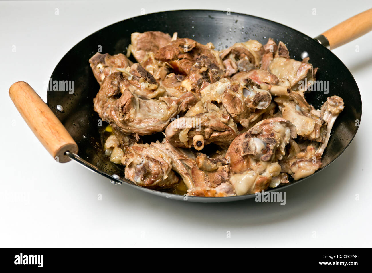 kid ovine meat ina pan Stock Photo - Alamy
