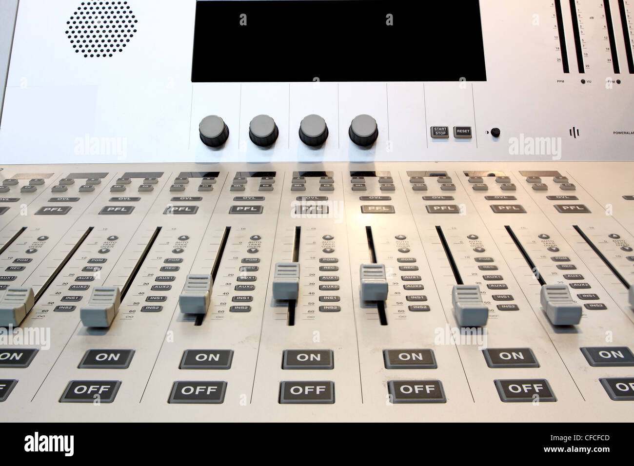 Part of an audio sound mixer with buttons Stock Photo - Alamy