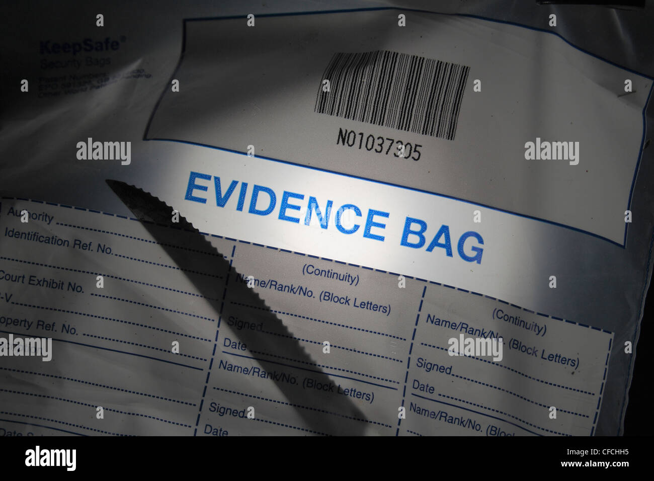 Back lit view of a British police Evidence Bag (as used in the UK) with ...