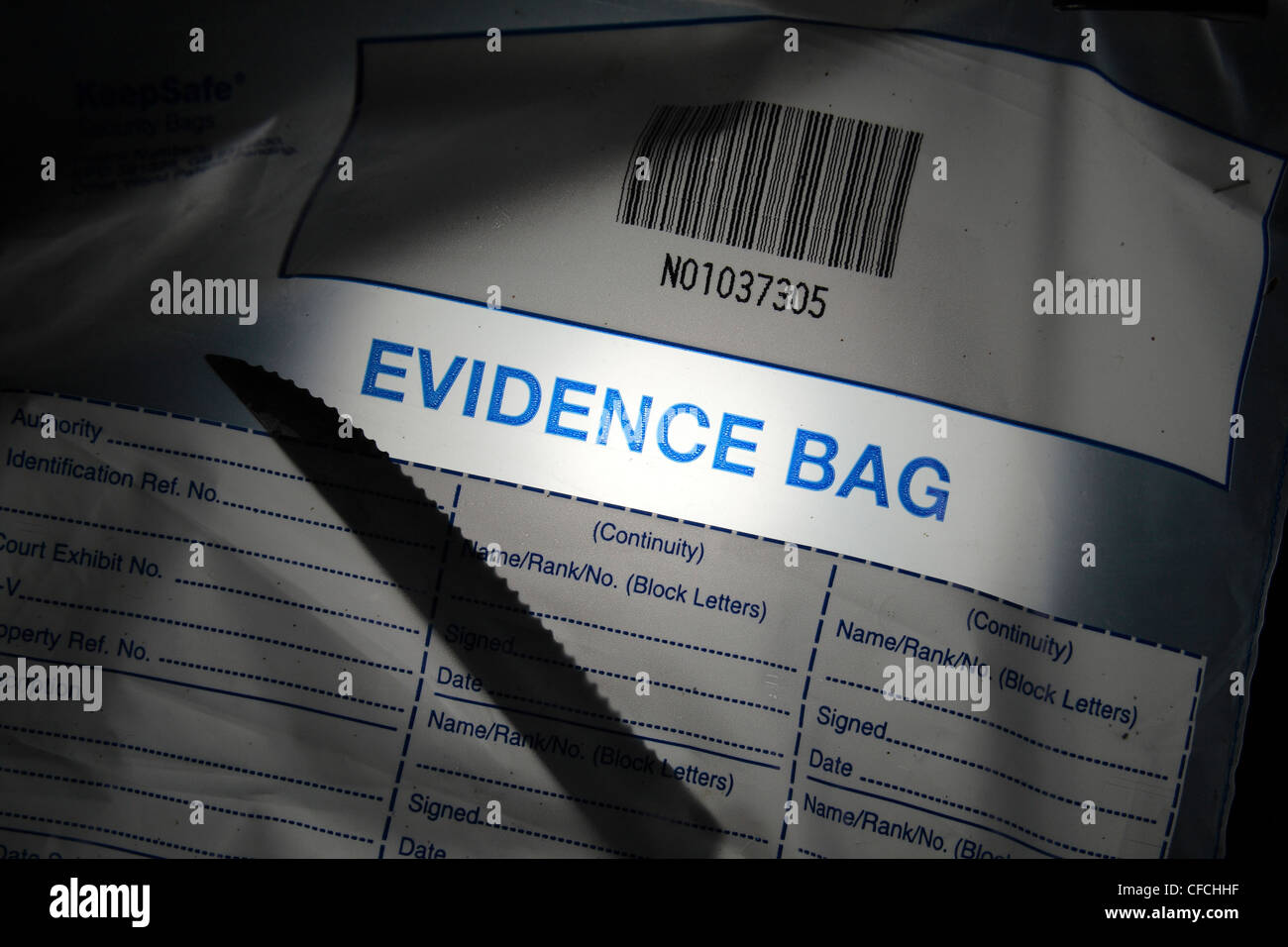 Back lit view of a British police Evidence Bag (as used in the UK) with ...