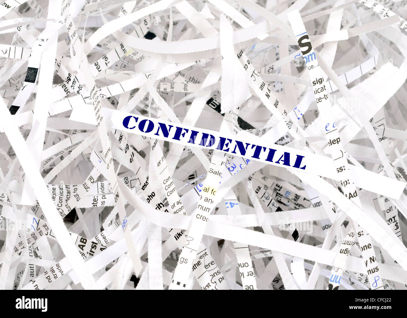 Confidential text surrounded by shredded paper. Great concept for ...
