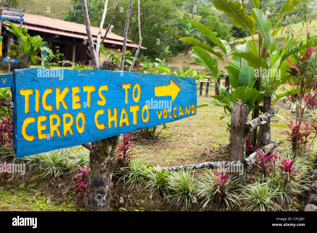 A sign points to Cerro Chato, the smaller of the two Volcanoes close to ...