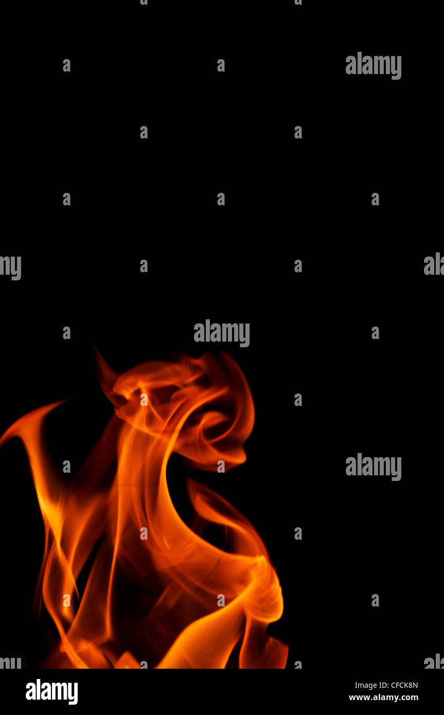 fire with a black background, abstract background Stock Photo - Alamy