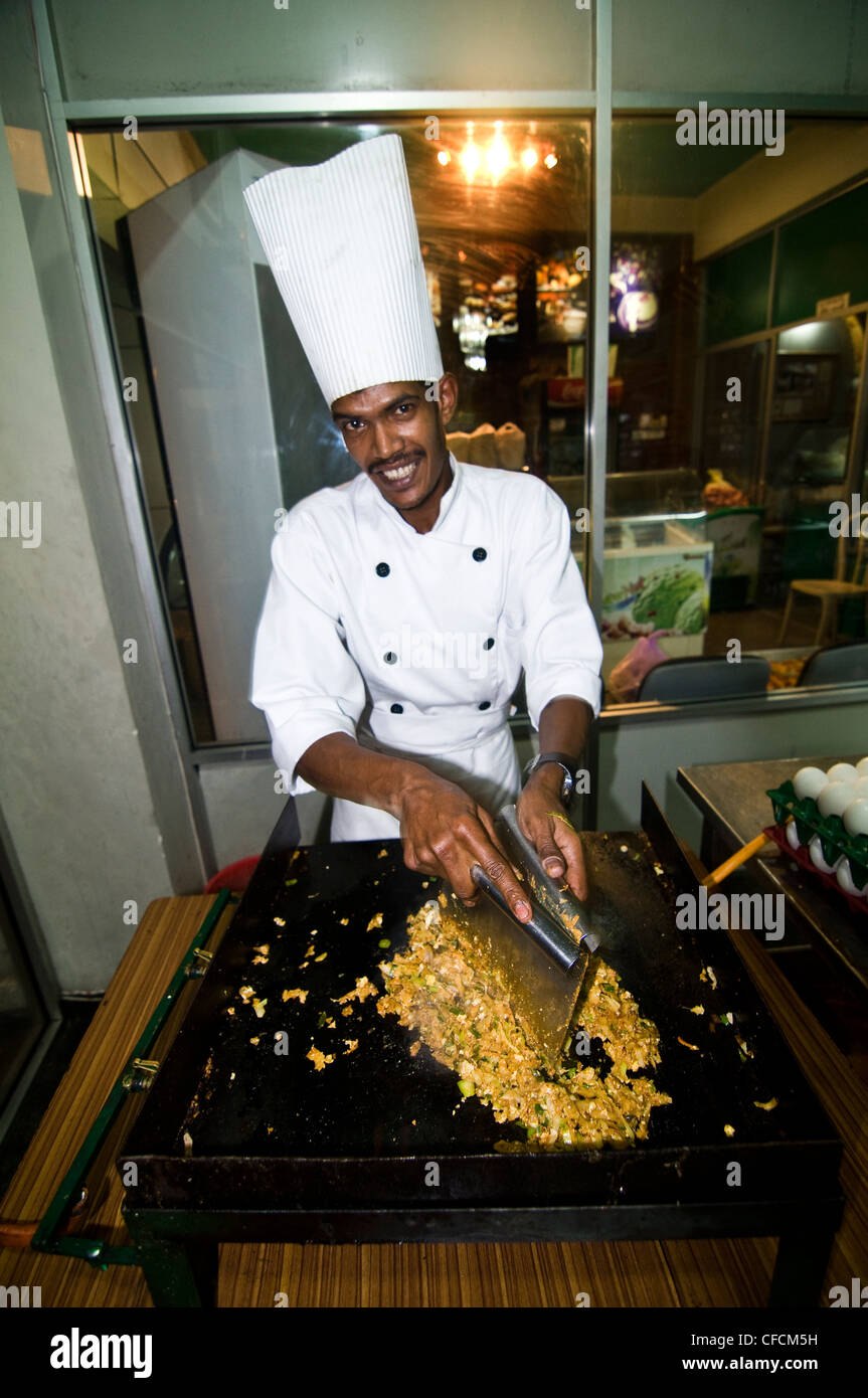 Kotu Roti being chopped in a popular restaurant in Kandy, Sri Lanka ...