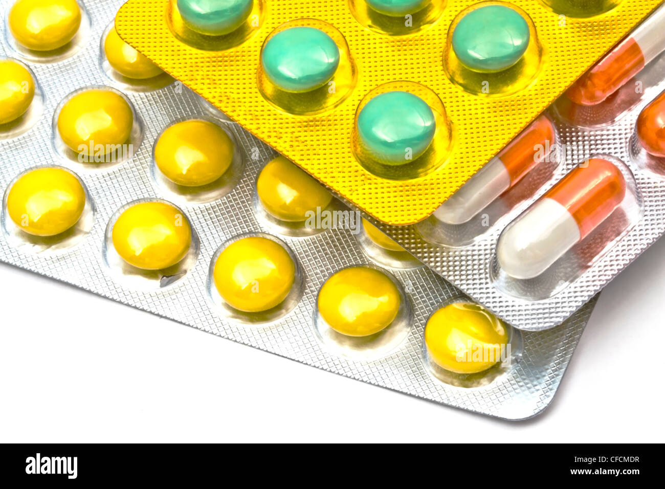 Different pills and capsules closeup on white background Stock Photo ...