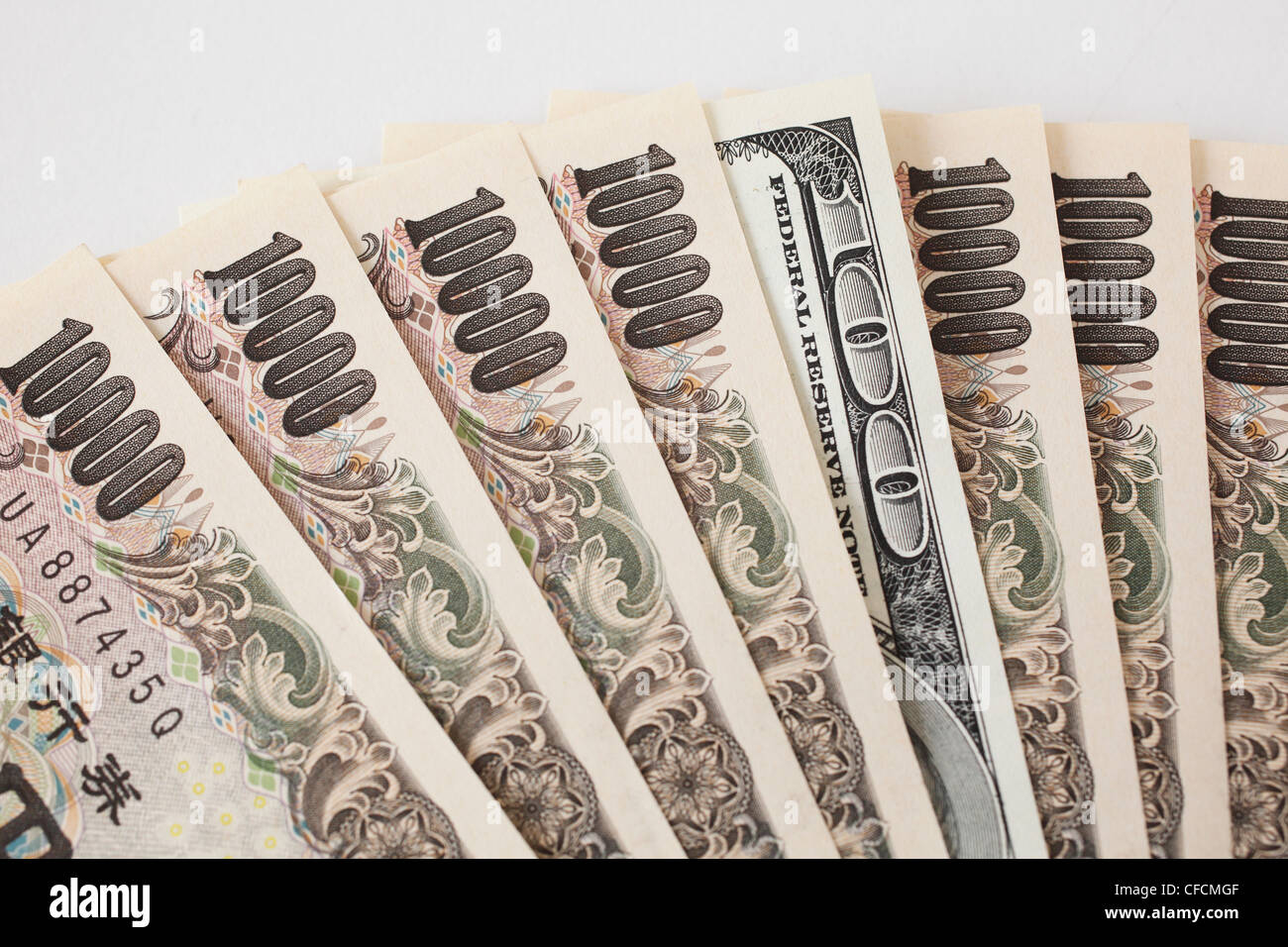 Japanease 10000 yen and 100 Dollar Stock Photo - Alamy