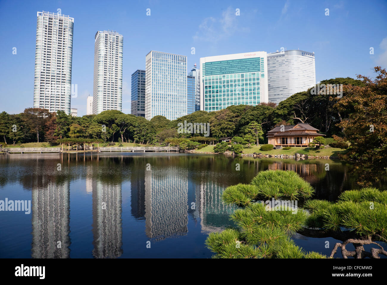 Japan, Tokyo, Hama Rikyu Japanese Garden and Shiodome Area Skyline ...