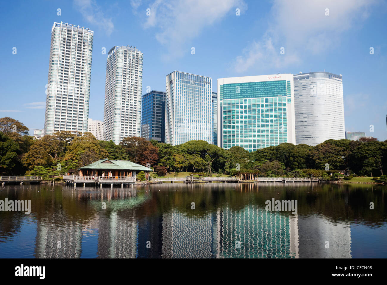 Japan, Tokyo, Hama Rikyu Japanese Garden and Shiodome Area Skyline ...