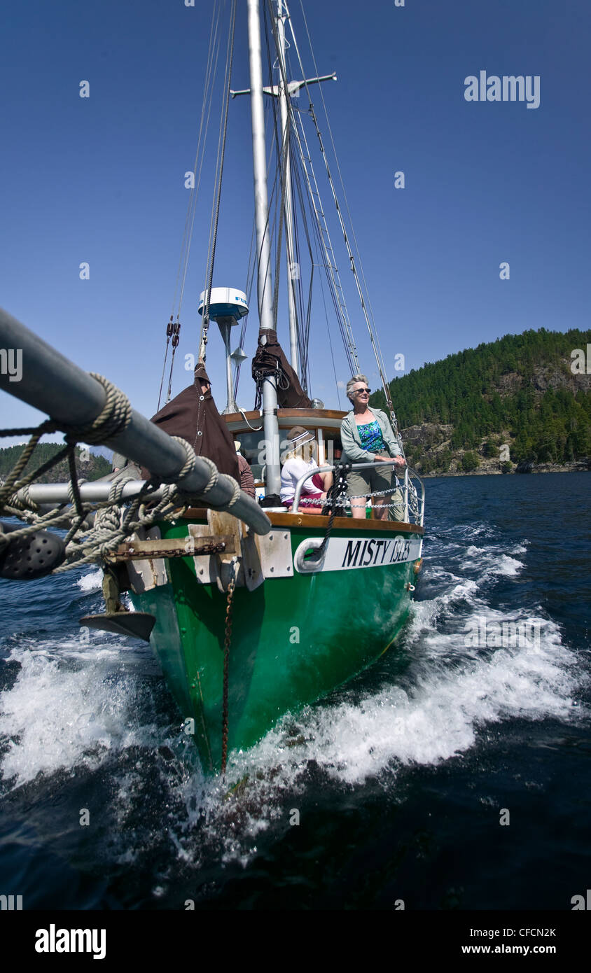 Passengers aboard Misty Isle's, a 42 ft schooner enjoy the scenic ...