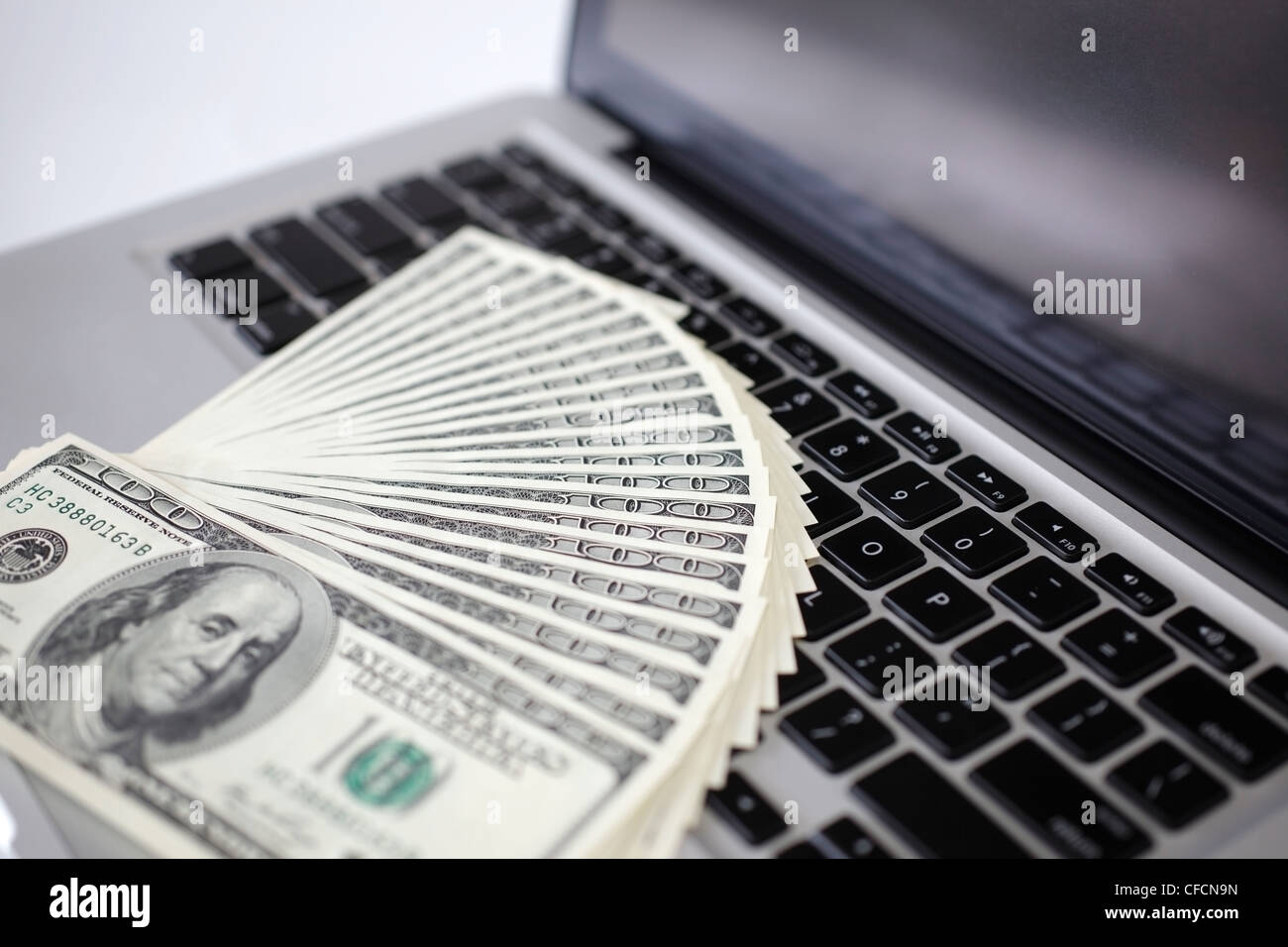 Computer keyboard and money Stock Photo - Alamy