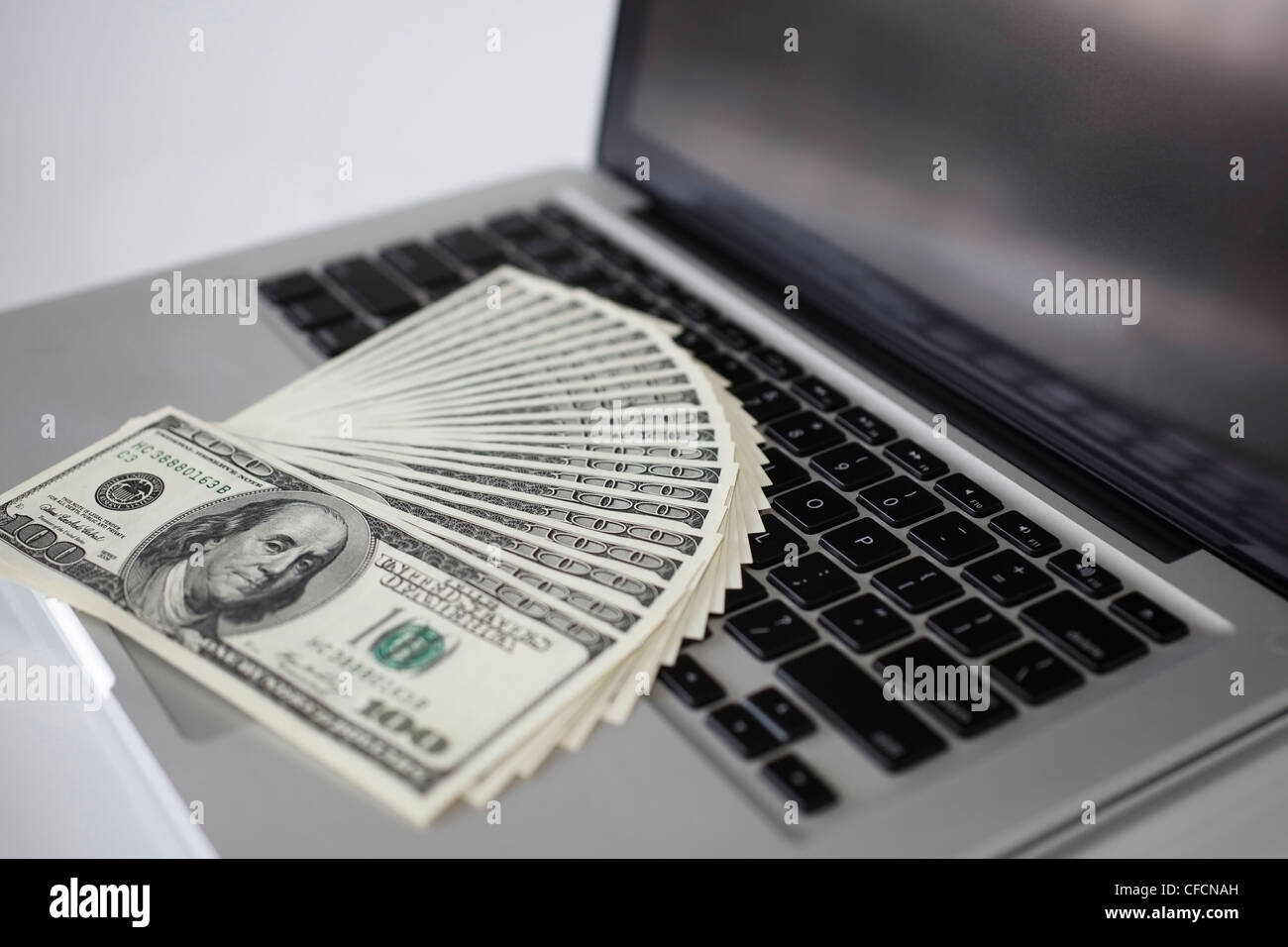 Computer keyboard and money Stock Photo - Alamy