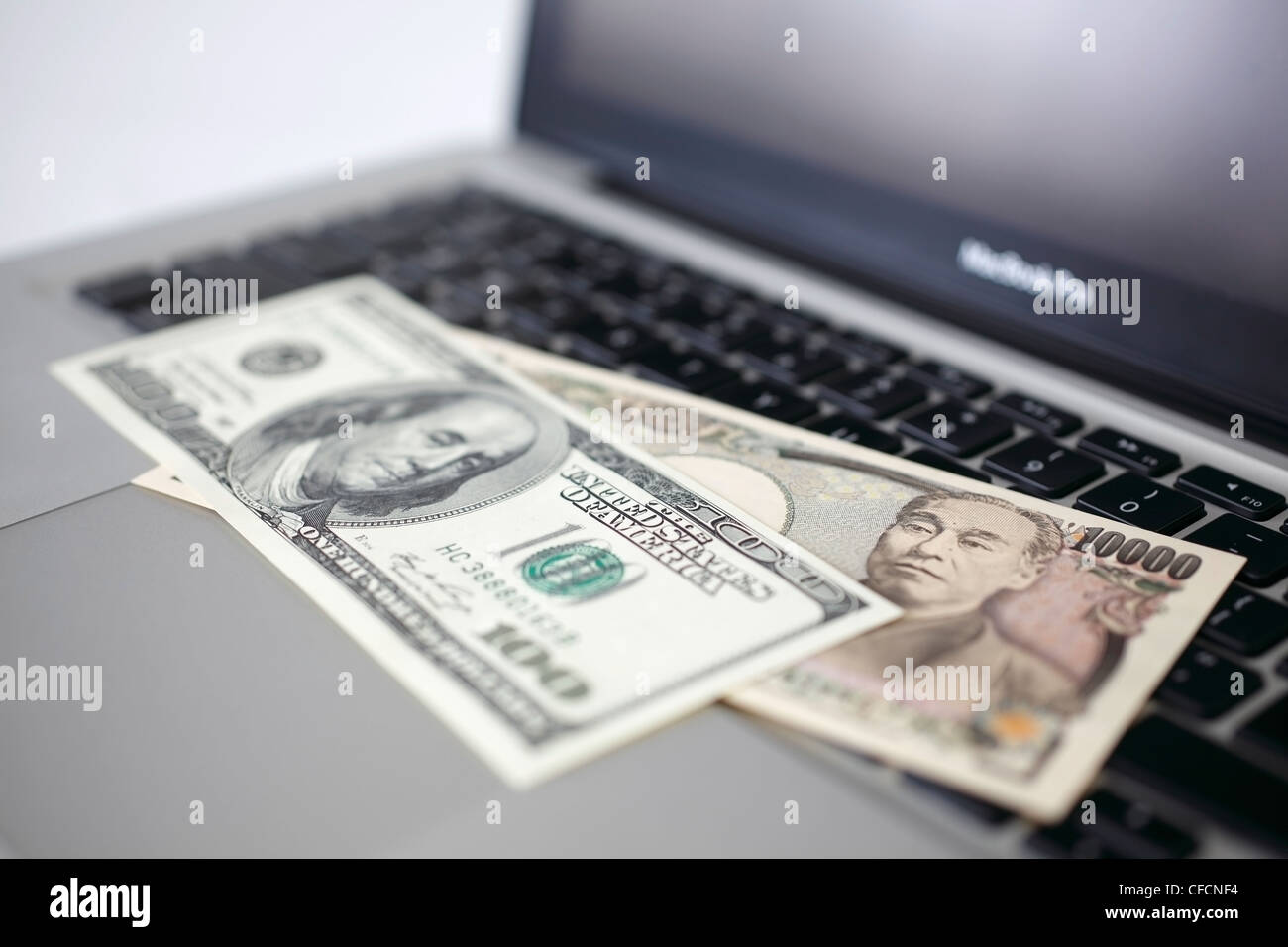 Computer keyboard and money Stock Photo - Alamy