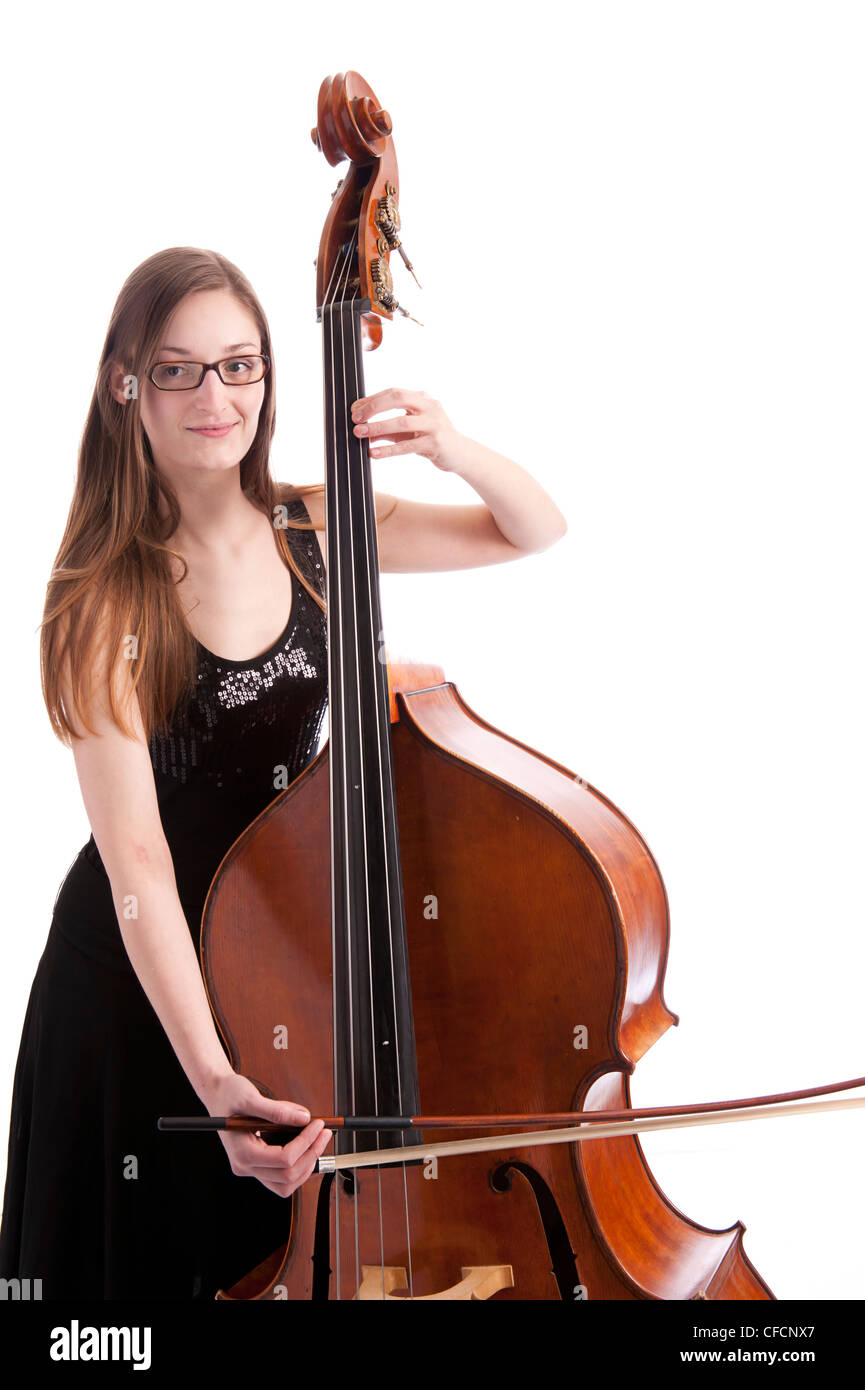 young woman playing the bass. Isolated on white background Stock Photo ...