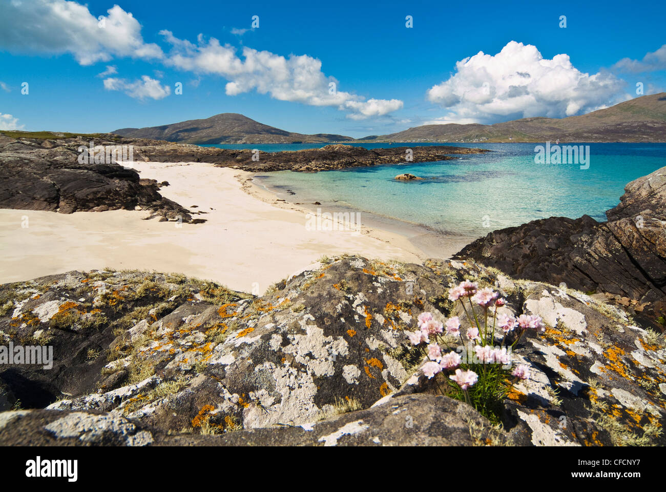 Beach on Vatersay looking towards the neighbouring island of Barra ...