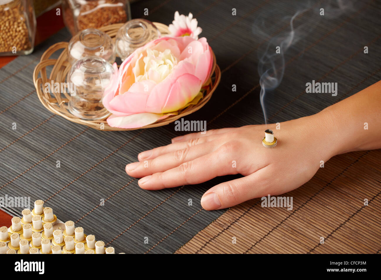TCM Traditional Chinese Medicine. Smoking mini moxa stick, flower and ...