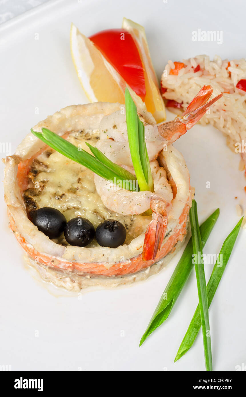 tasty prepared fish with rice and vegetables Stock Photo - Alamy