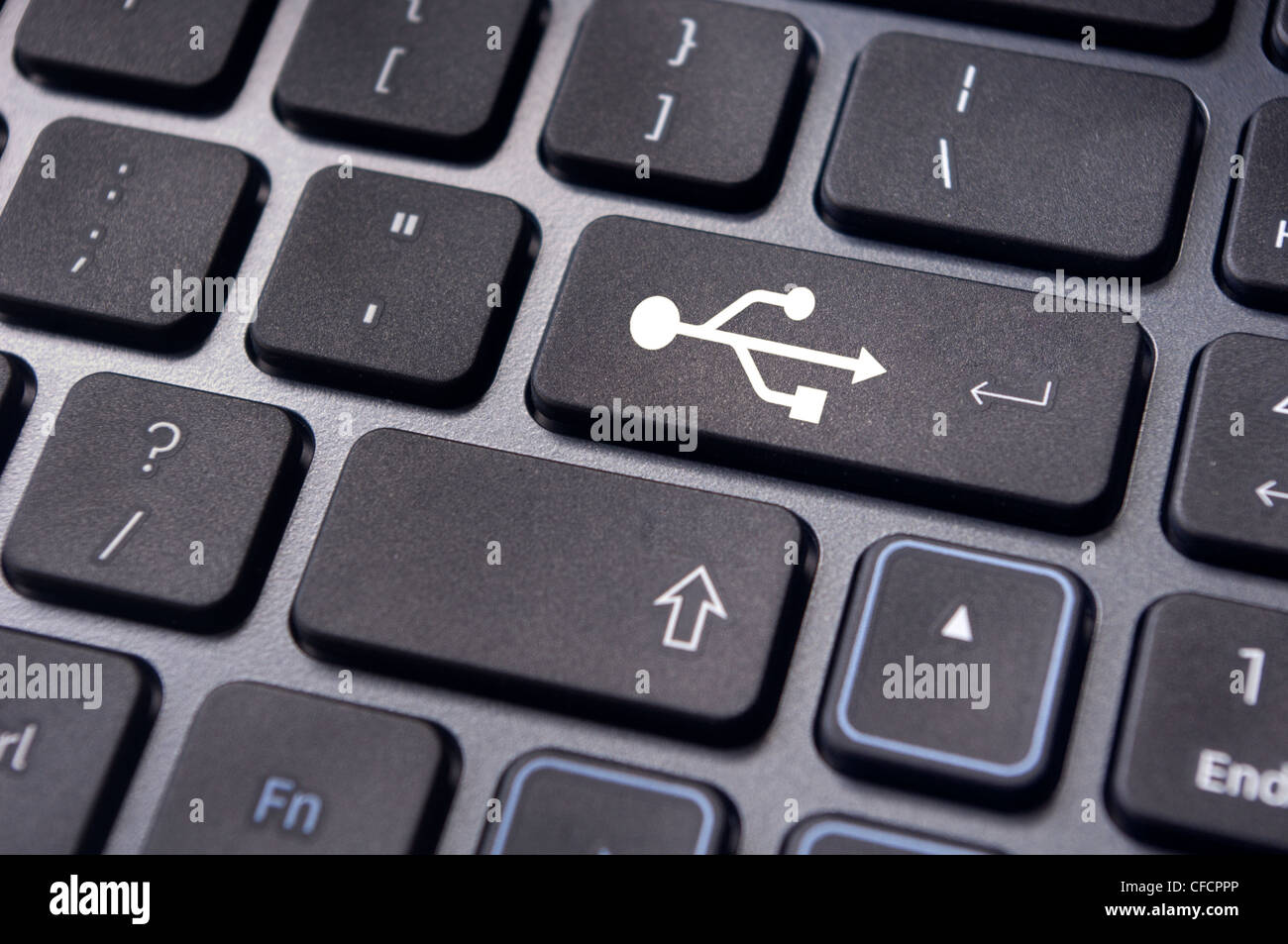 USB signs on enter key of keyboard, for concepts of USB ready devices ...