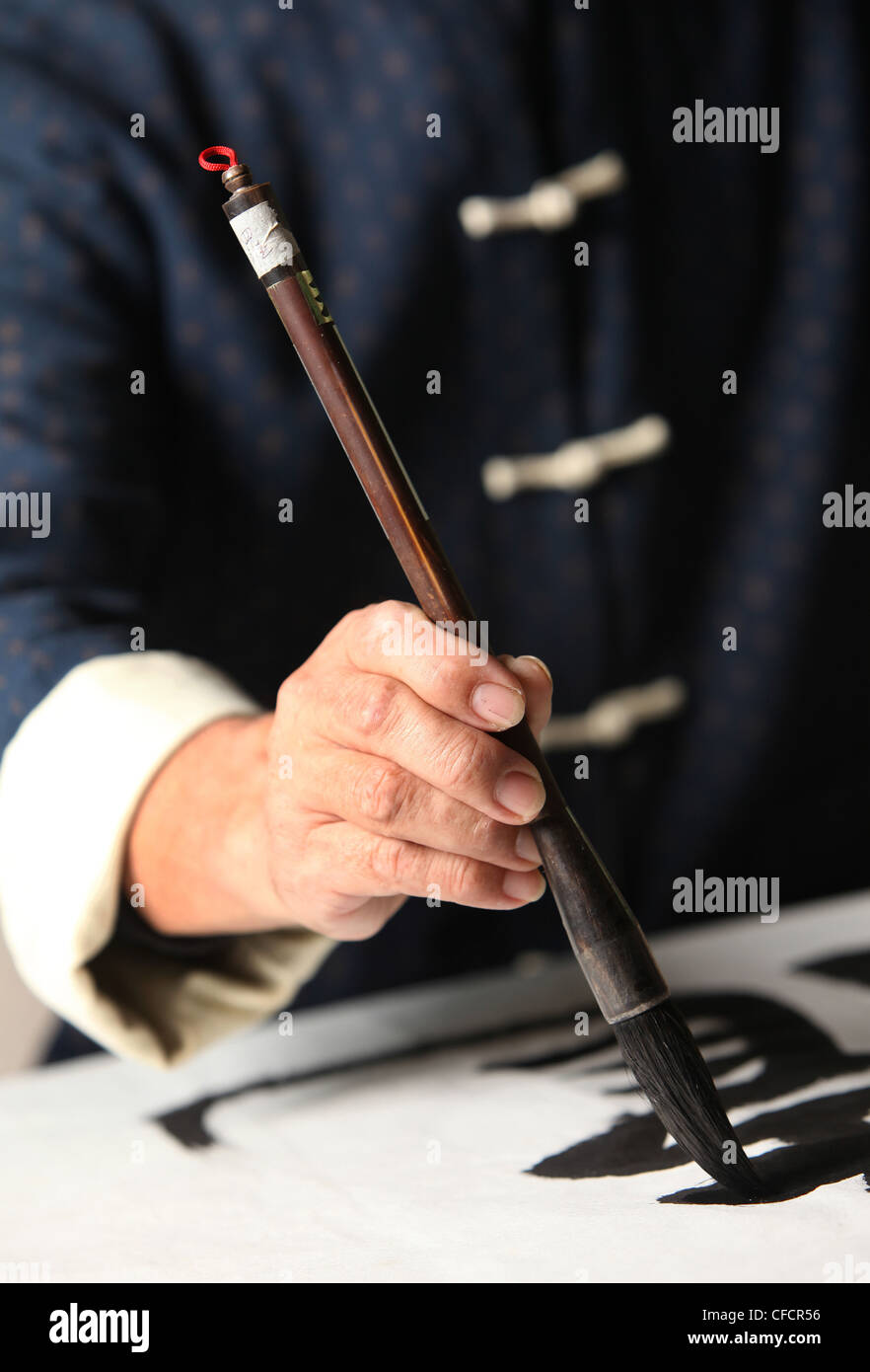 Calligrapher calligraphy man writing hi-res stock photography and ...