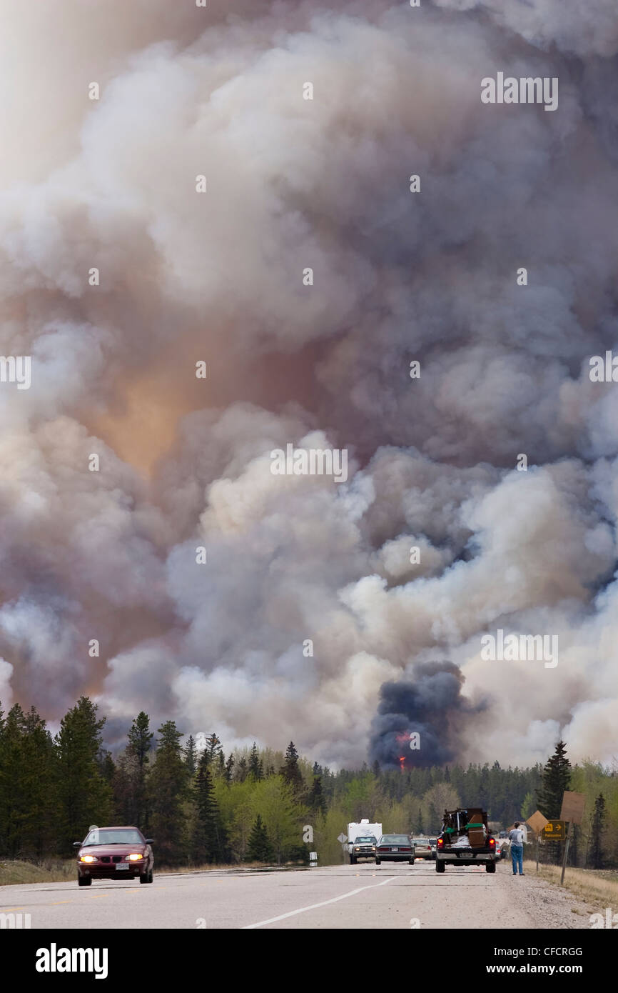 Forest fire visible highway road Jasper National Stock Photo - Alamy