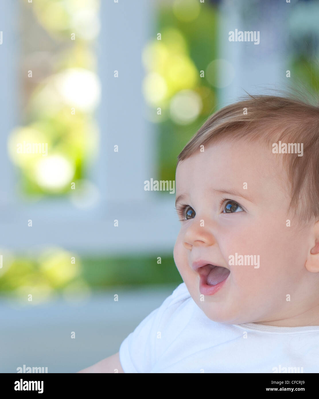A baby with mouth open Stock Photo - Alamy