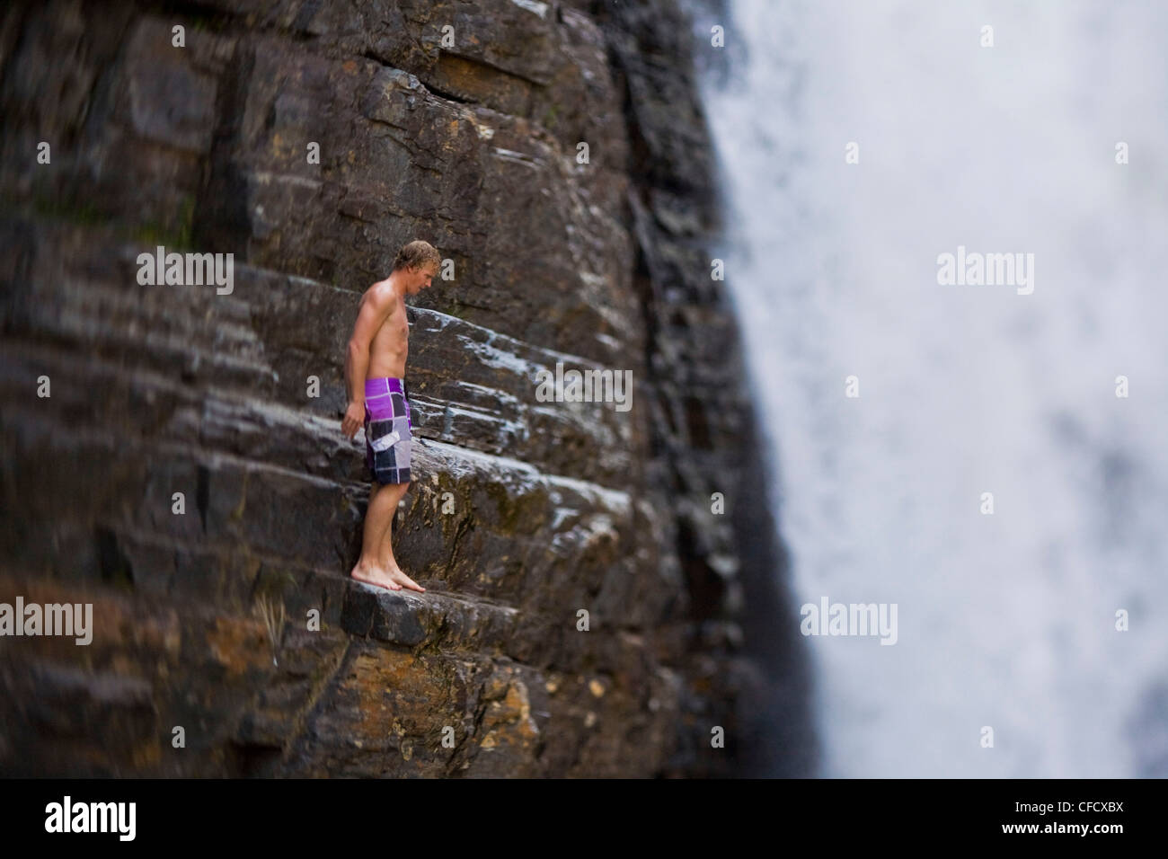 Young man cliff diving hi-res stock photography and images - Alamy